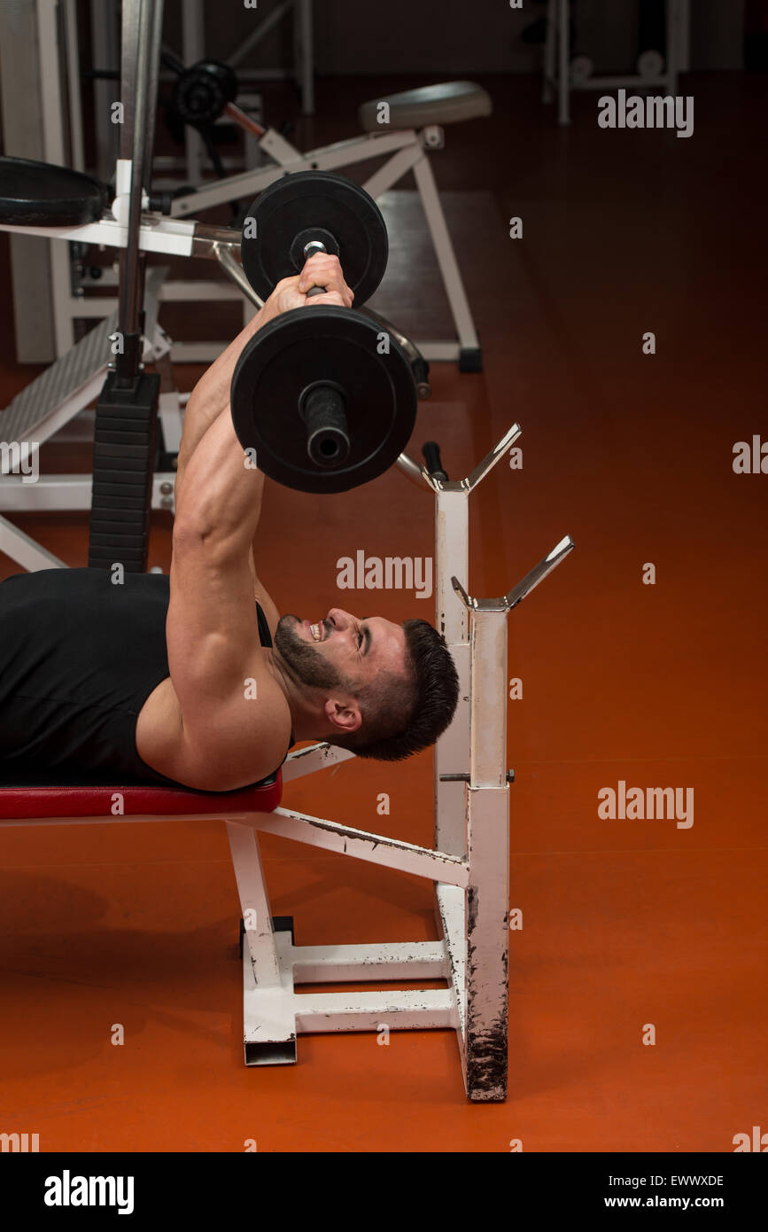 Muscular Man Exercising Triceps Stock Photo - Alamy