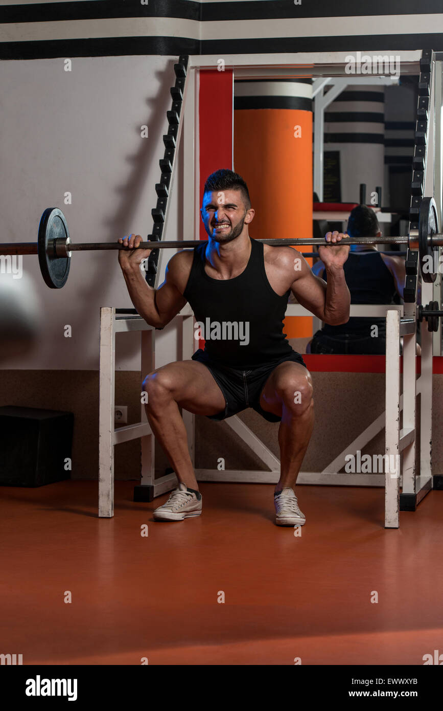 Barbell squats hi-res stock photography and images - Alamy