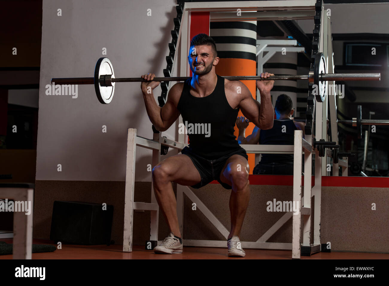 Men Doing Squats Stock Photo - Alamy