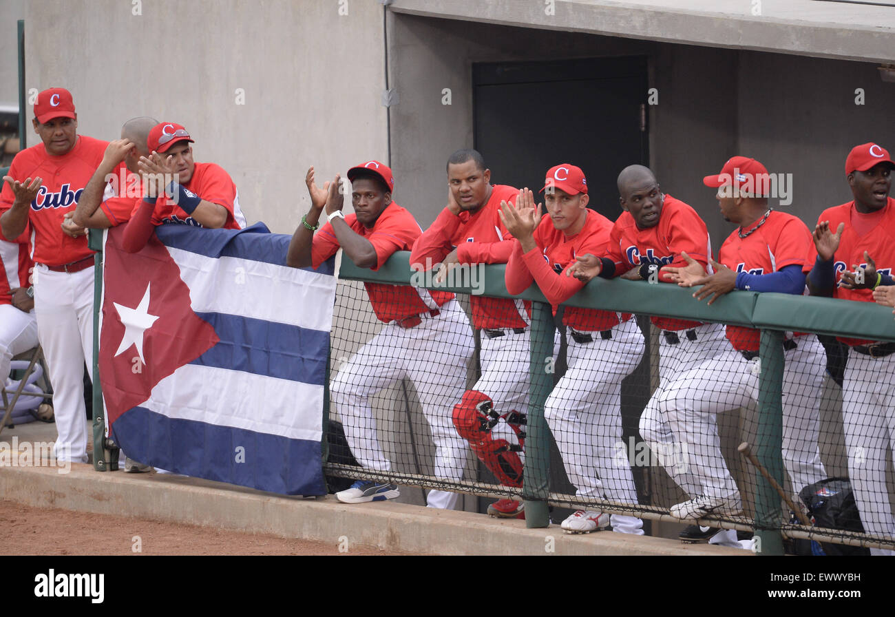 Cary, North Carolina, USA. 1st July, 2015. Cuba's dugout encourage ...