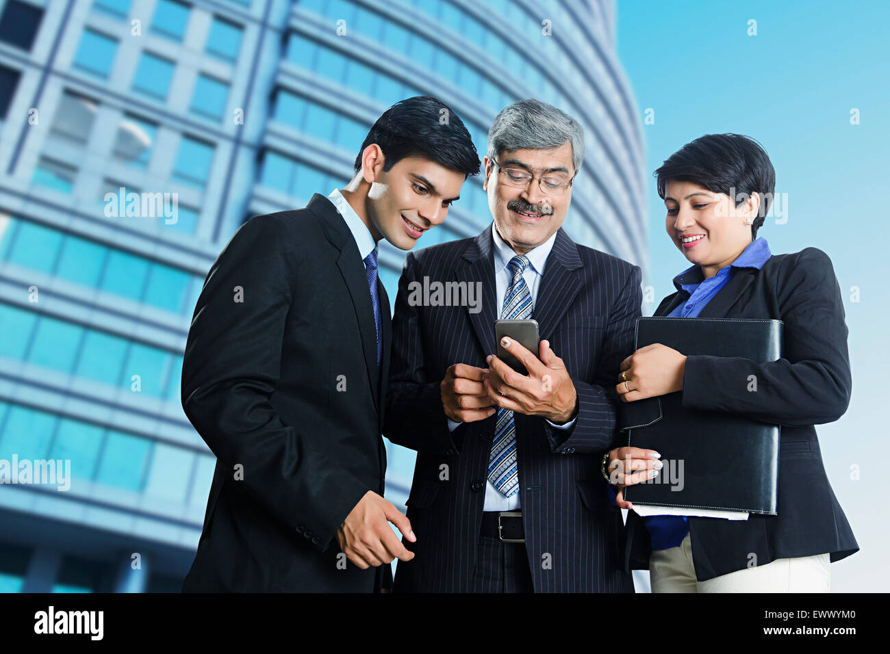 Indian people checking phone hi-res stock photography and images - Alamy