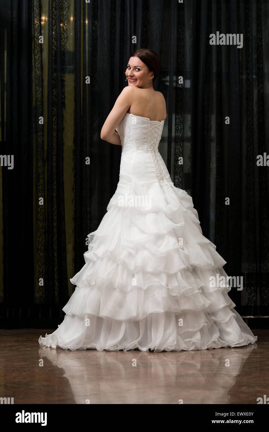 Back Of Brides Wedding Dress Stock Photo - Alamy