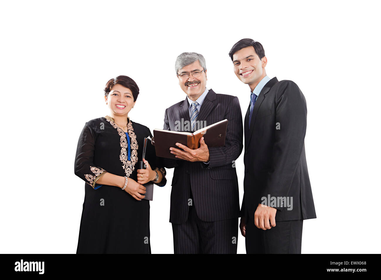 3 indian Business partner Book reading Discussion Stock Photo - Alamy