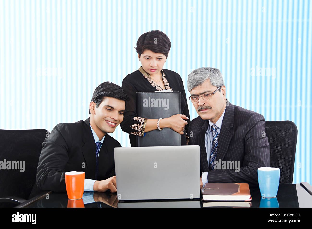 Formal meeting business partners share hi-res stock photography and ...