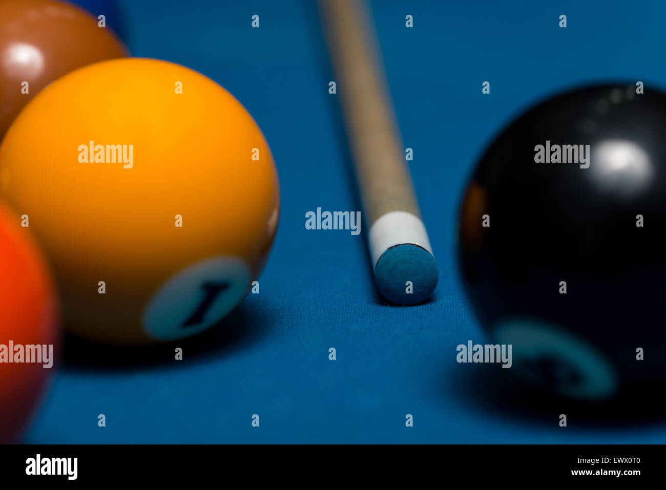 Pool Table With Balls And Cue Stick Stock Photo - Alamy