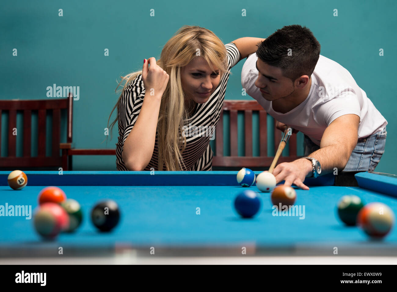 Friends playing billiards hi-res stock photography and images - Alamy