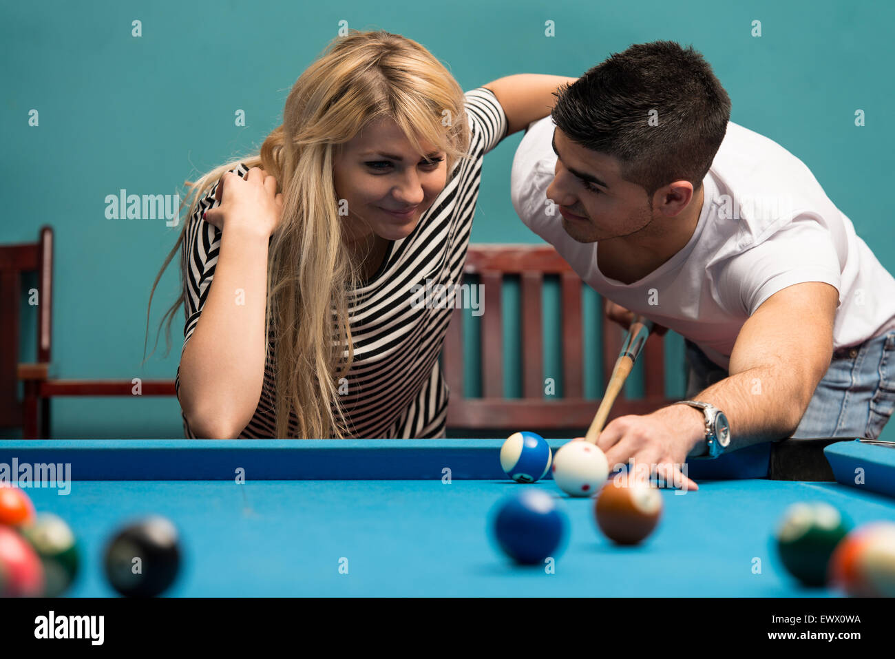 Couple Playing Pool At The Bar Stock Photo - Alamy