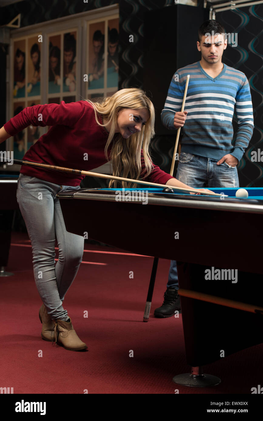 Beautiful Couple Playing Pool Stock Photo - Alamy