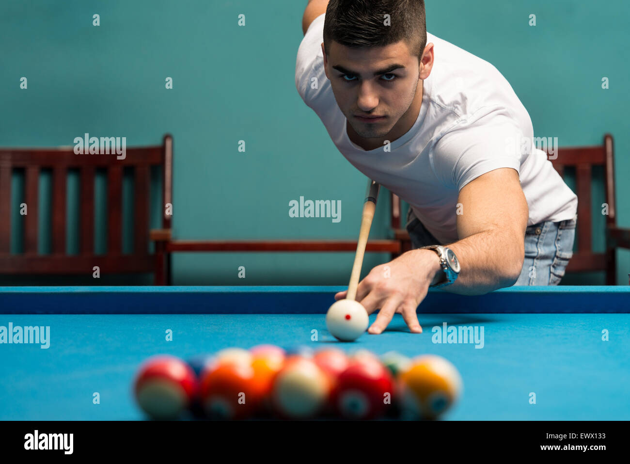 Blue pool table person hi-res stock photography and images - Alamy