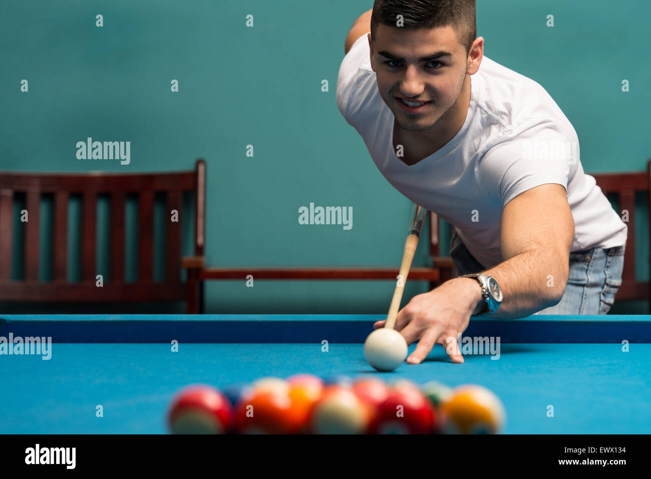 Blue pool table person hi-res stock photography and images - Alamy