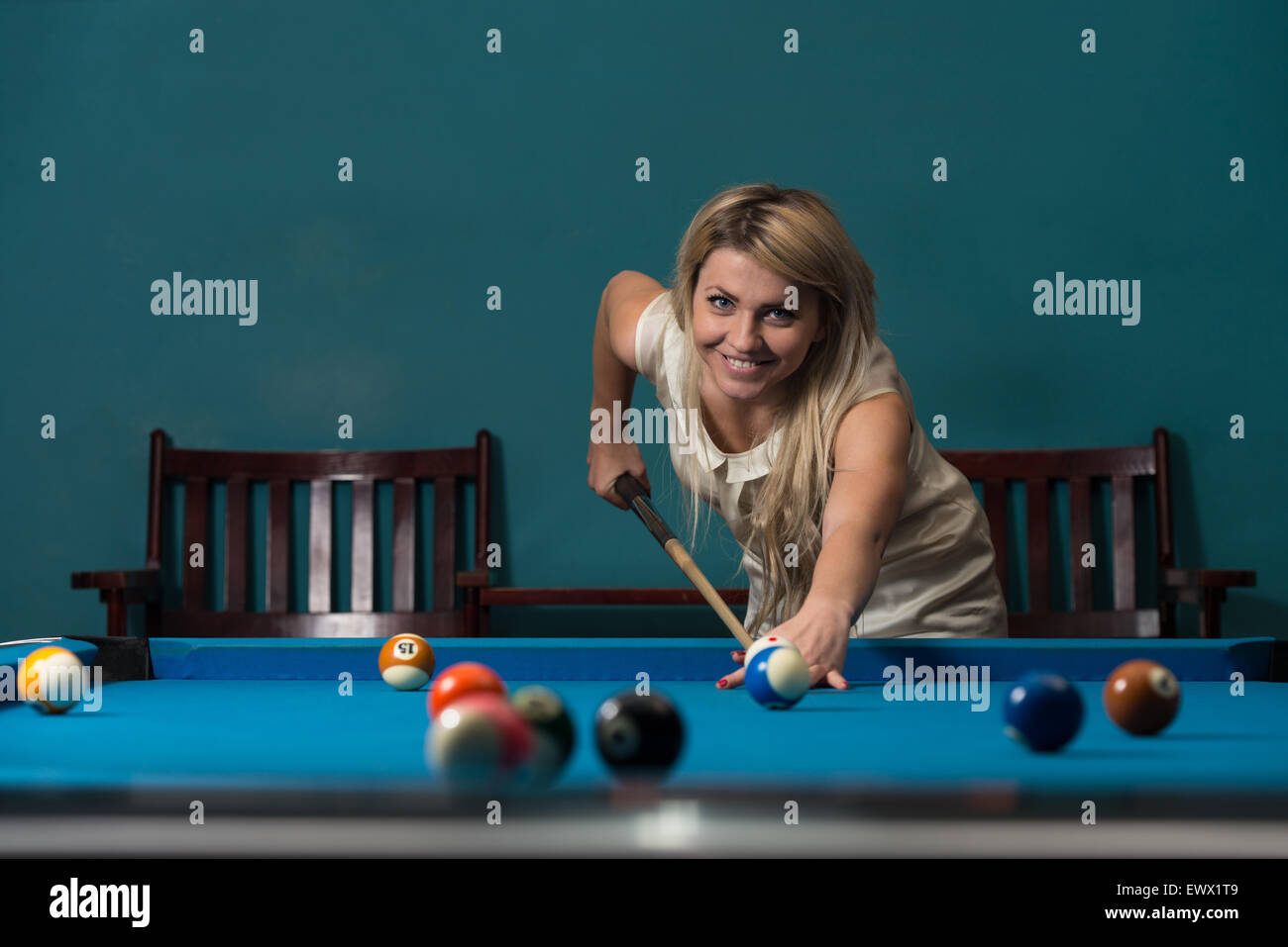 Girl Playing Billiards Stock Photo - Alamy