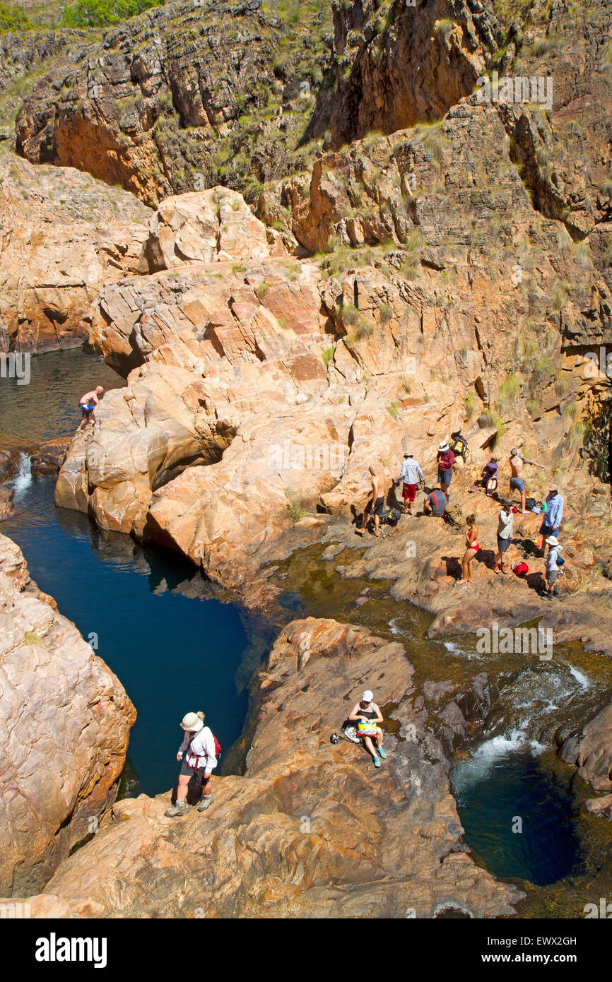 Visitors at the top of the falls at Maguk (Barramundi Gorge) in Kakadu ...