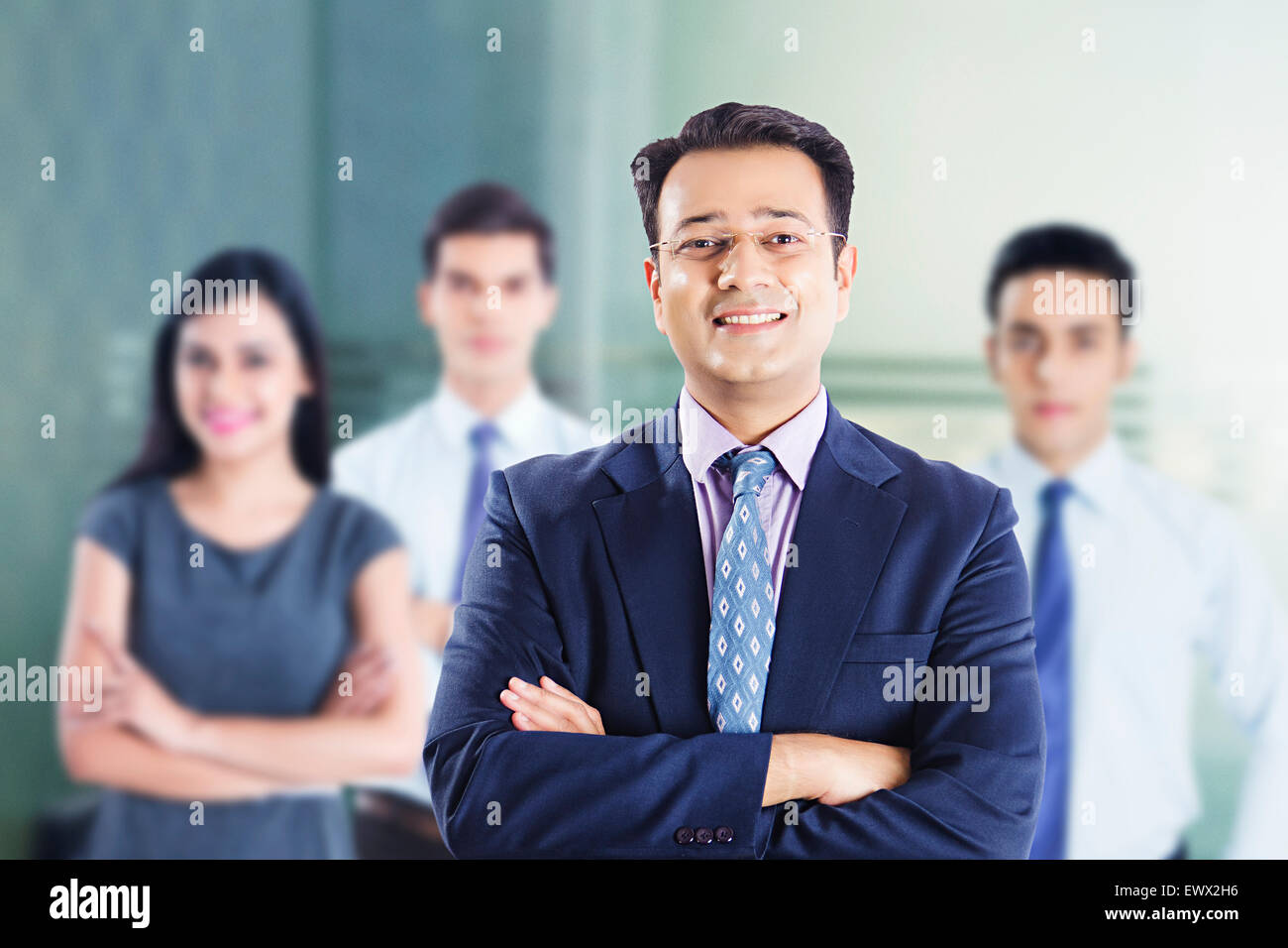 4 indian Business partner standing pose Stock Photo - Alamy