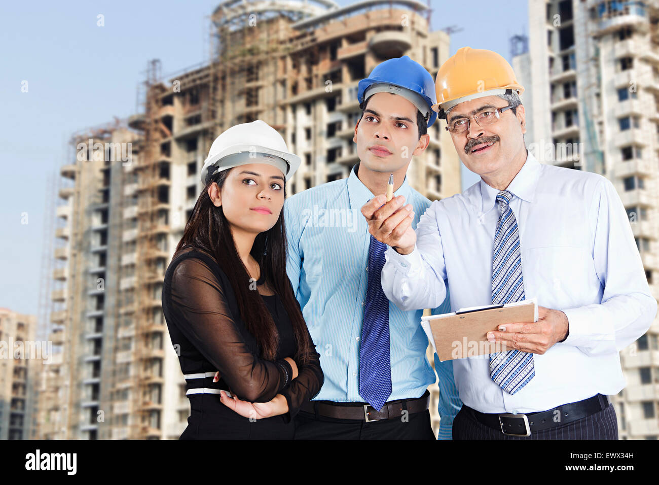3 indian Architect Construction Site Checking Stock Photo - Alamy