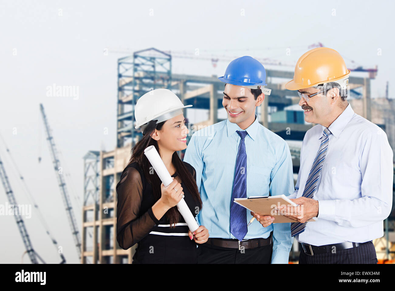 3 indian Architect Construction Site Discussion Stock Photo - Alamy