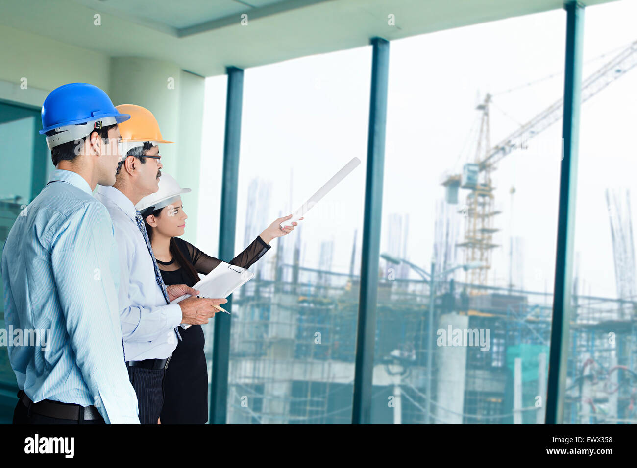 3 indian Architect Construction Site Checking Stock Photo - Alamy