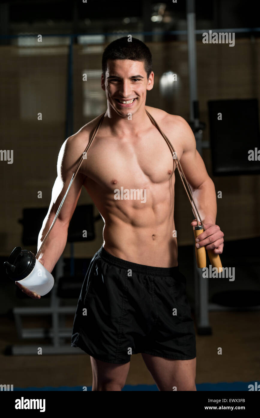 Handsome Muscular Men With Jumping Rope Stock Photo - Alamy