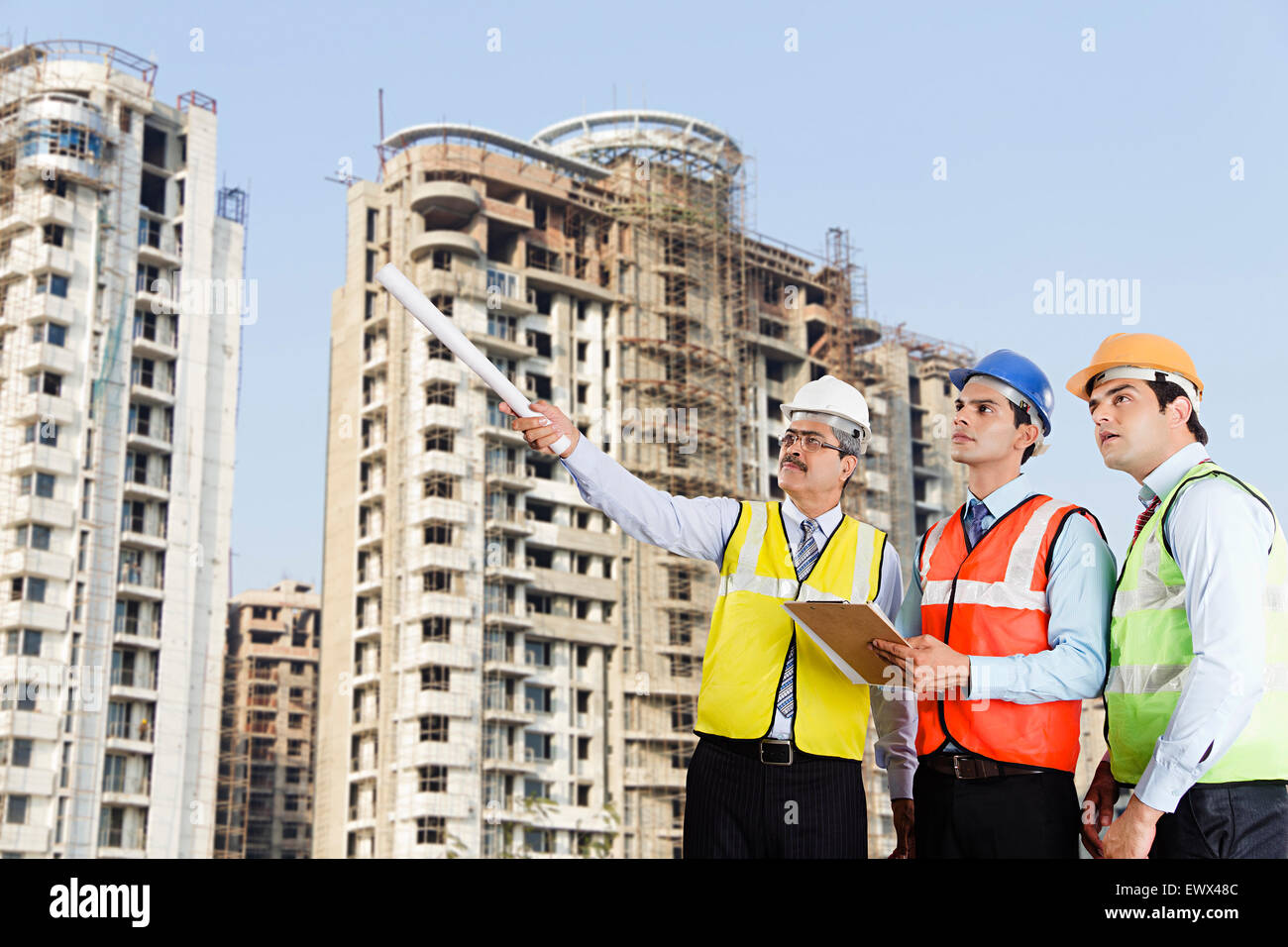 3 indian Architect Construction Site Checking Stock Photo - Alamy