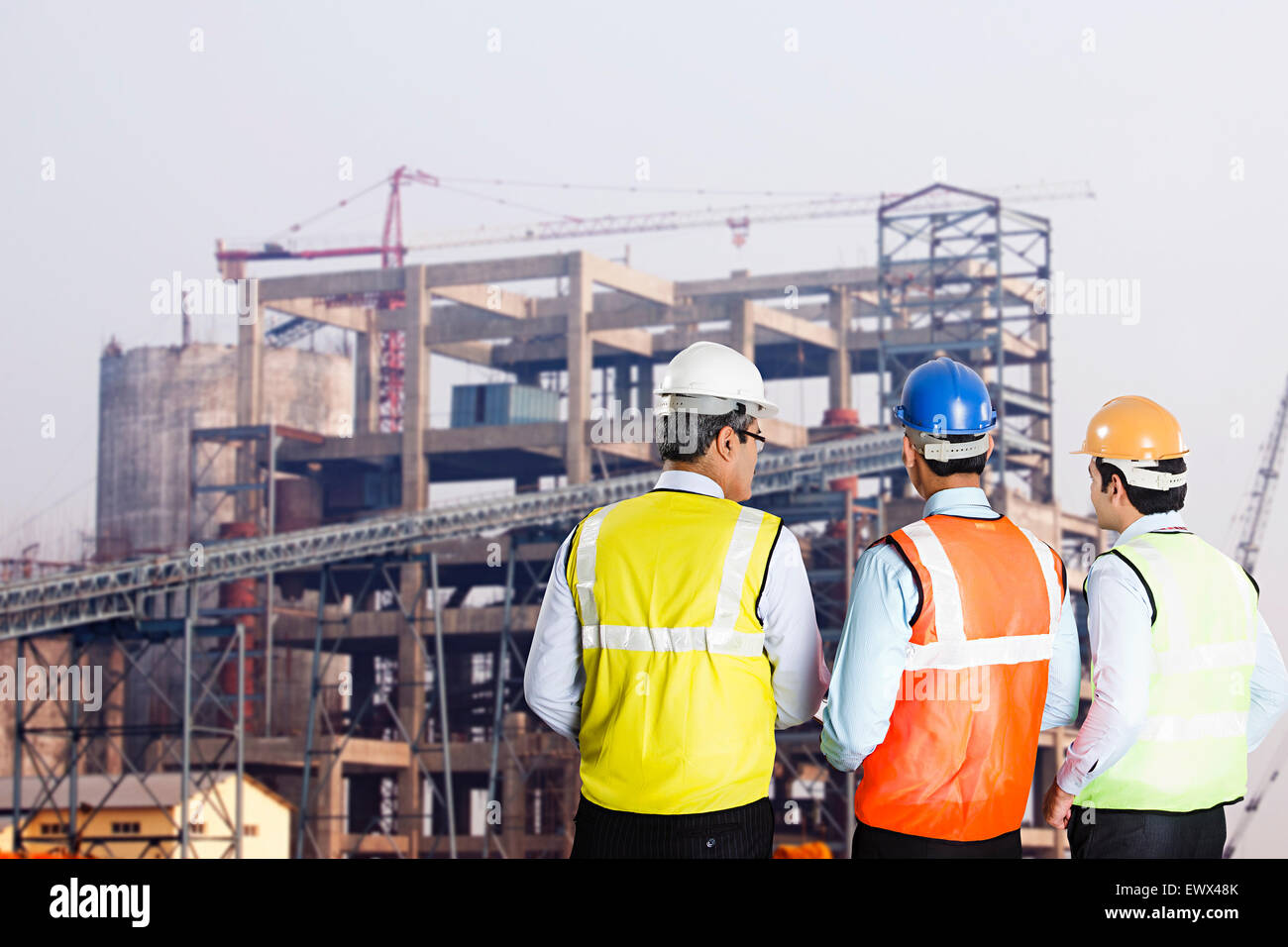 2 indian Architect Construction Site Discussion Stock Photo - Alamy