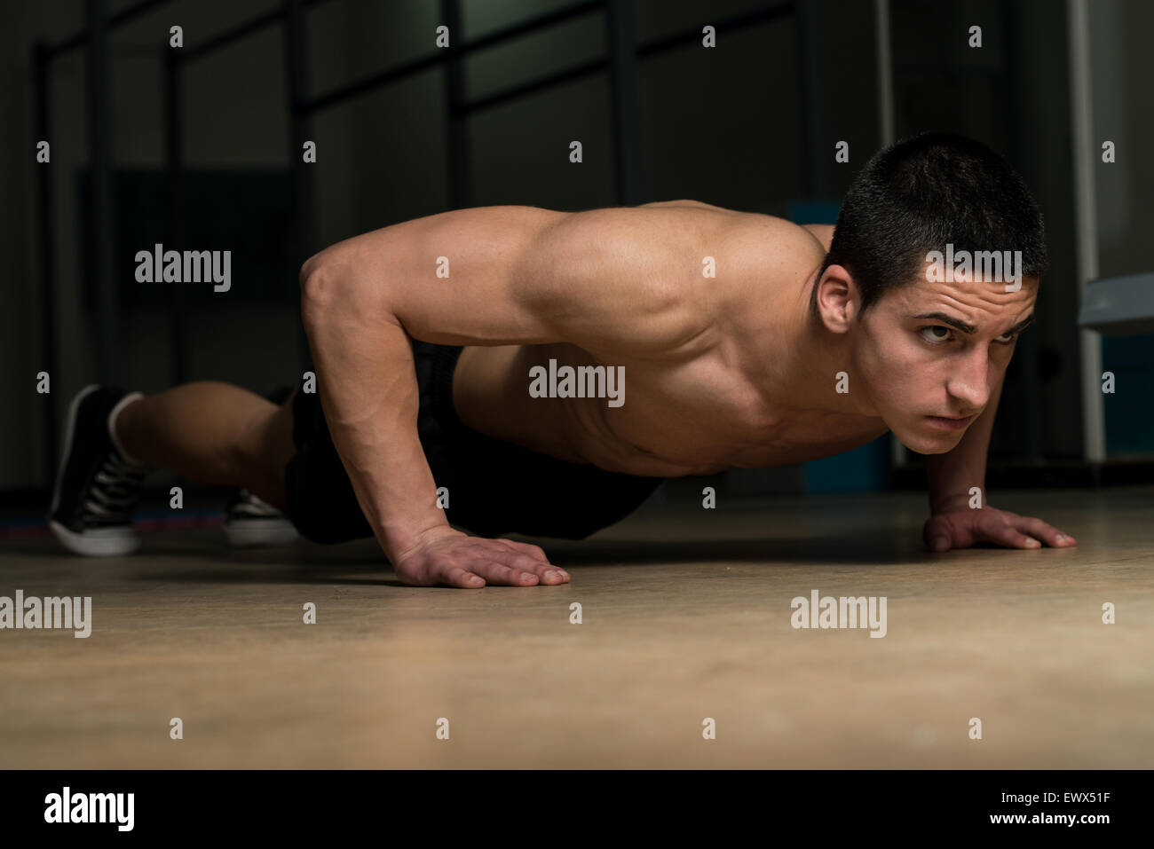 Young Man Doing Pushups Stock Photo - Alamy