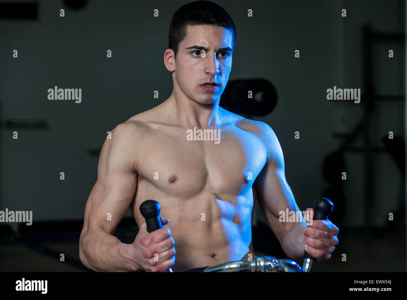 Back Exercises On A Seated Row Machine Stock Photo - Alamy