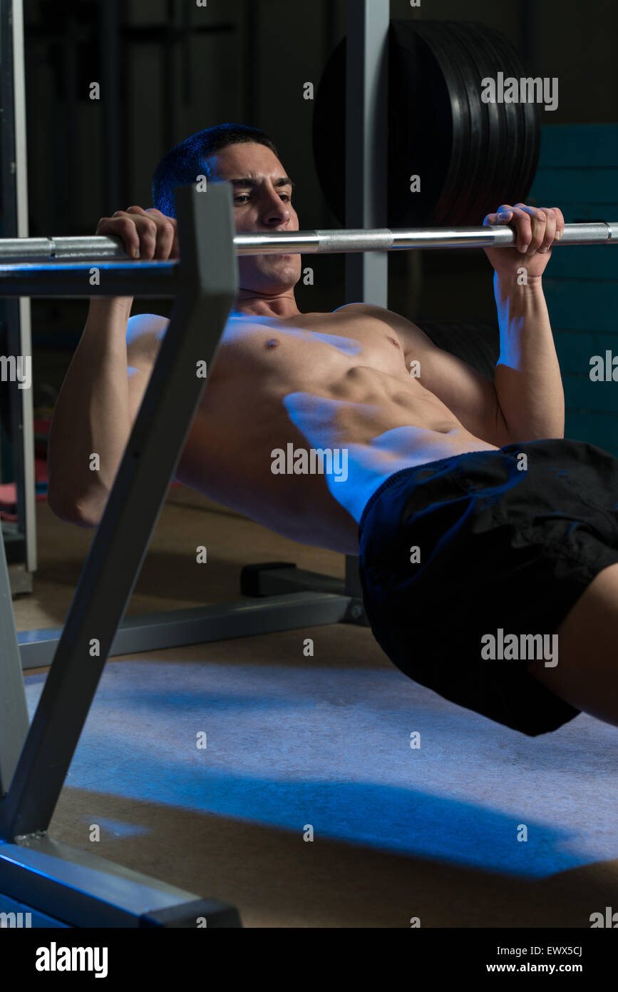 Men Exercising Back On Horizontal Barbell Pull Up Stock Photo - Alamy