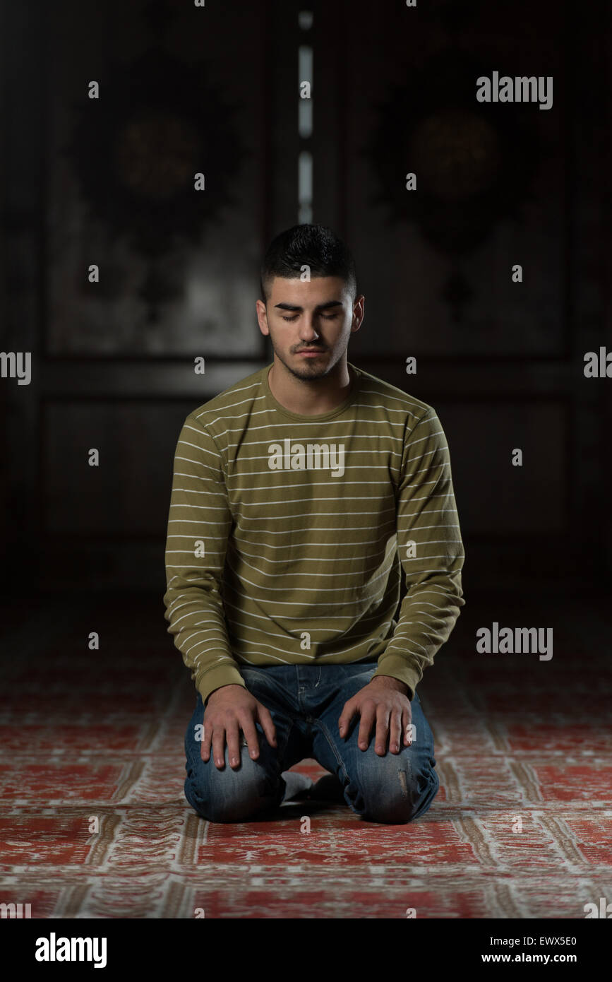 Muslim Man Is Praying In The Mosque Stock Photo - Alamy