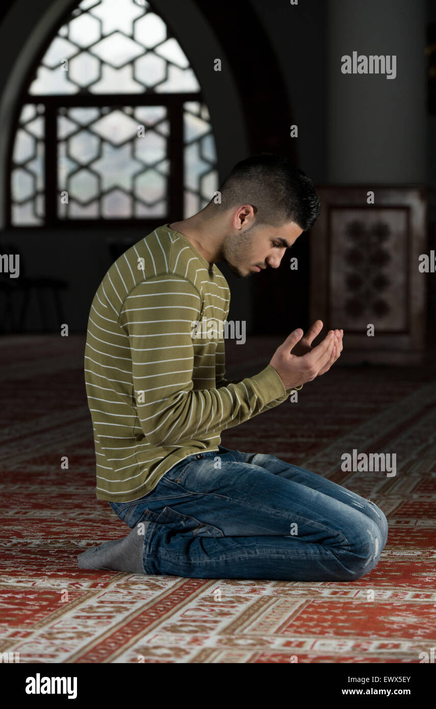Muslim Man Is Praying In The Mosque Stock Photo - Alamy