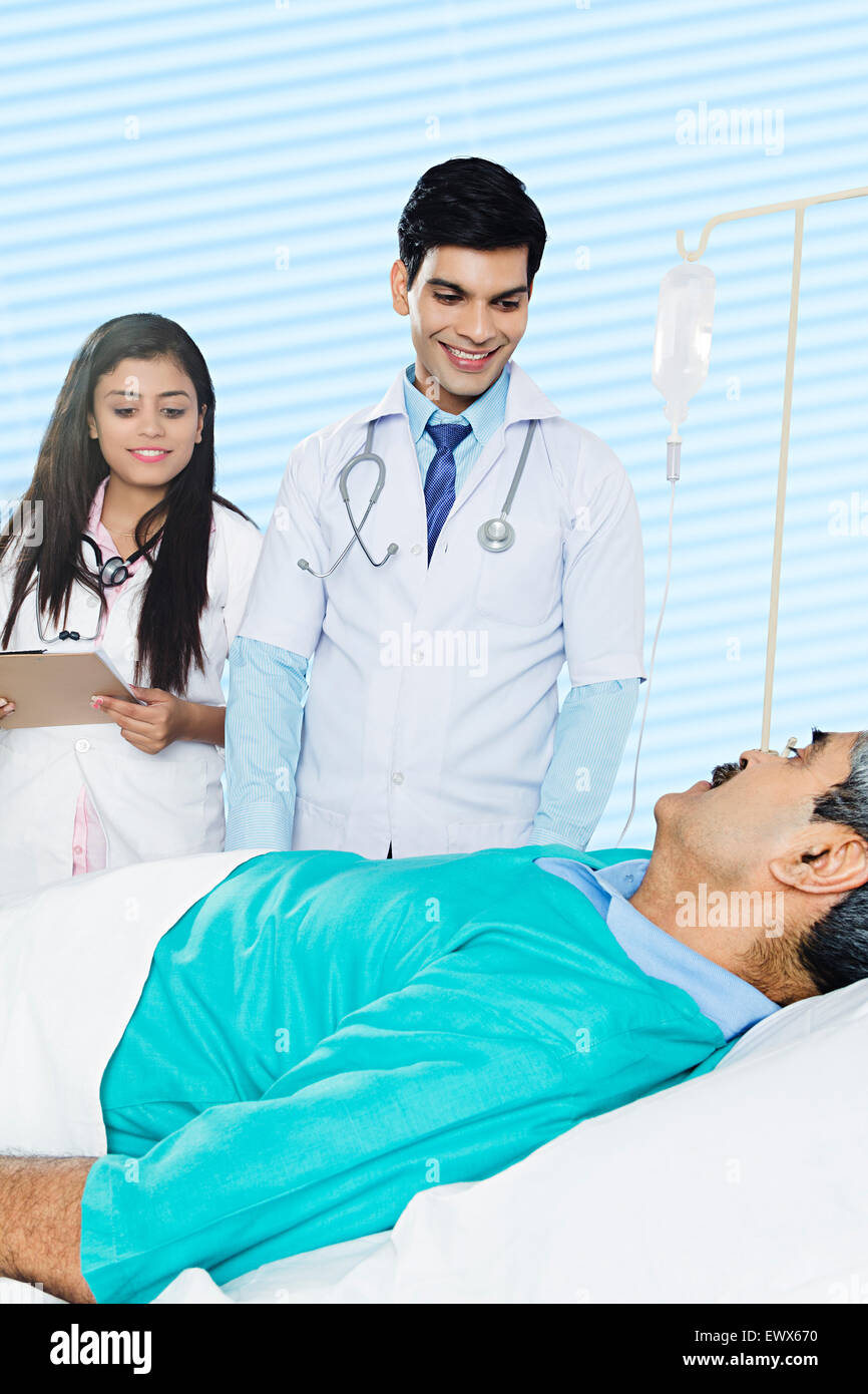 indian Doctor Patient Checking Stock Photo - Alamy