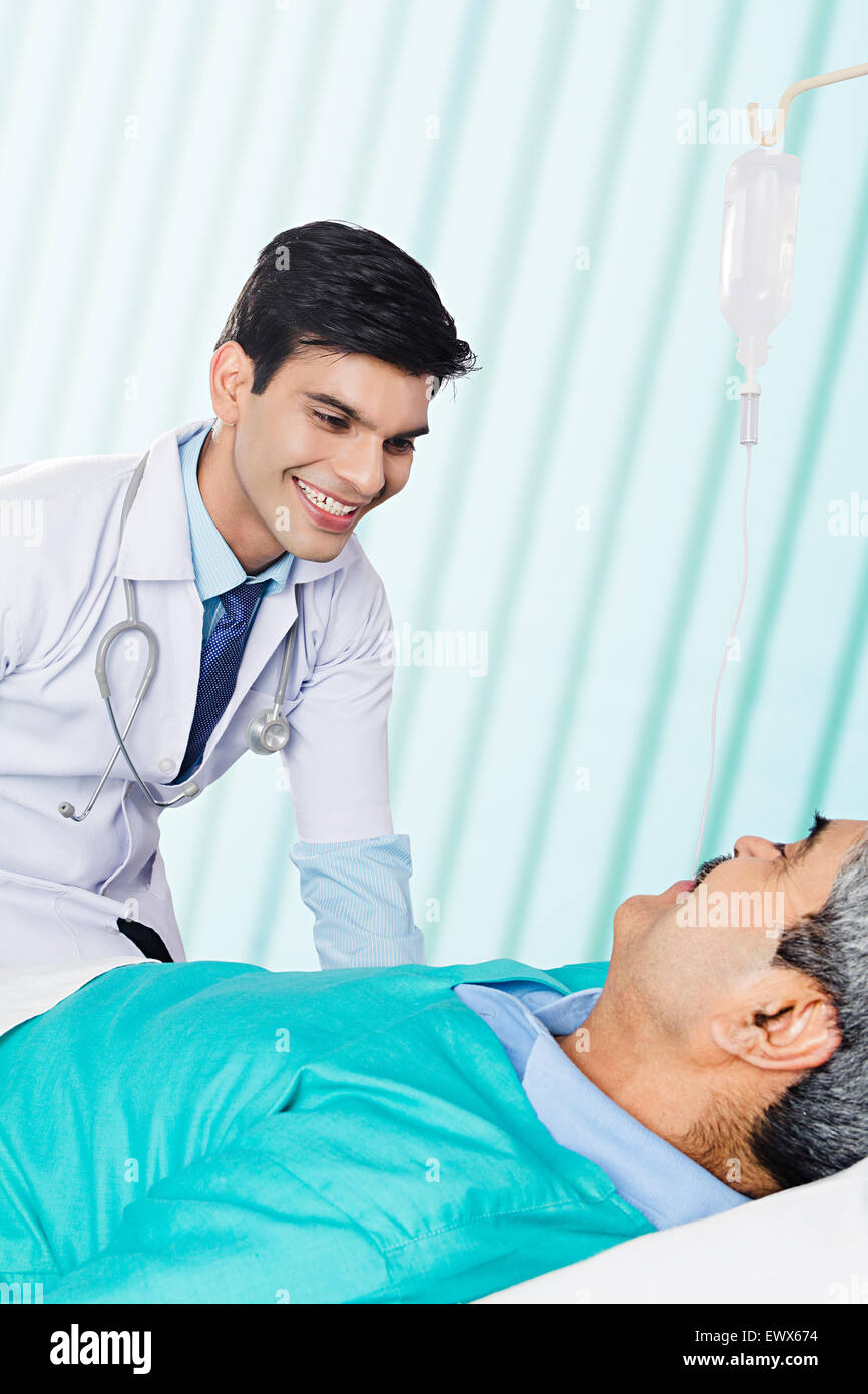 indian Doctor Patient Checking Stock Photo - Alamy