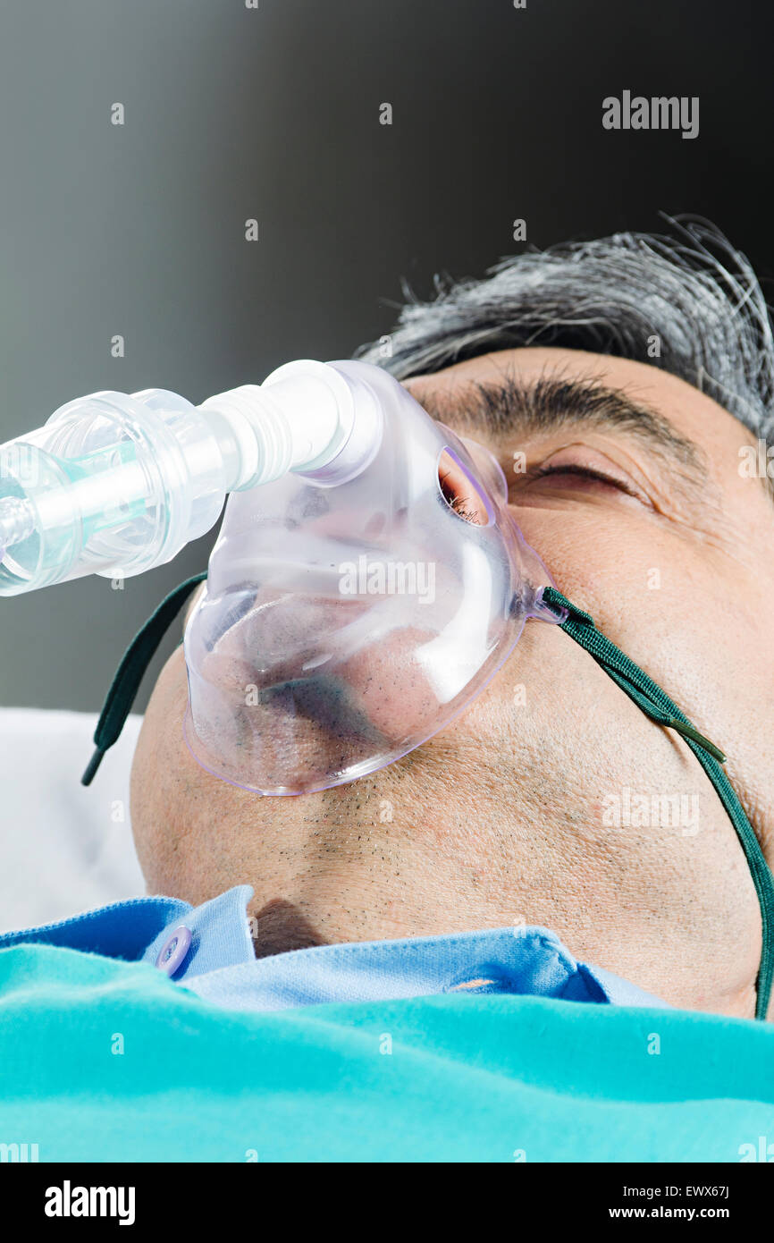 1 indian man Patient Emergency Oxygen Mask Stock Photo - Alamy