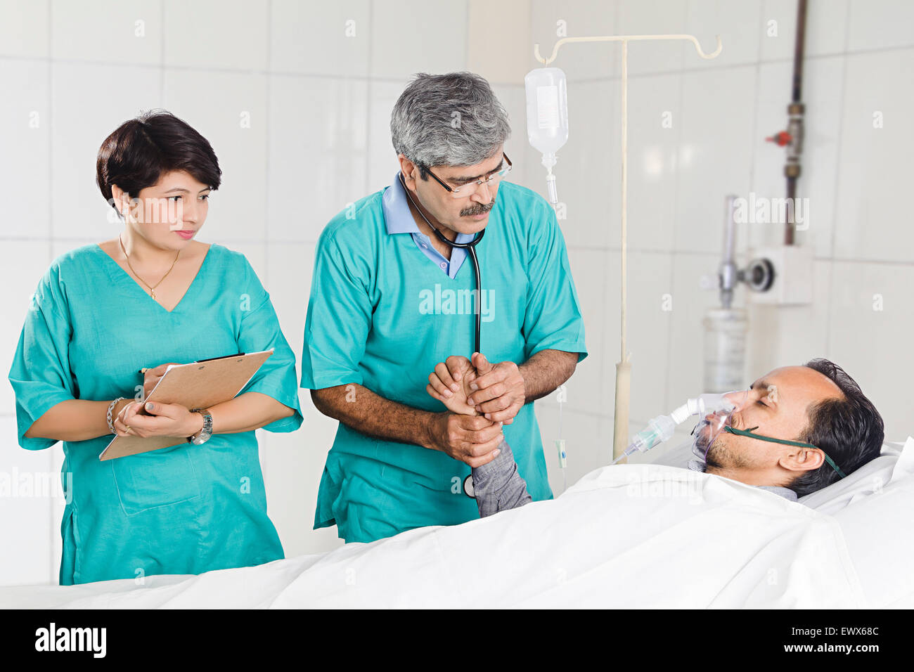 Indian nurse helping patient hi-res stock photography and images - Alamy