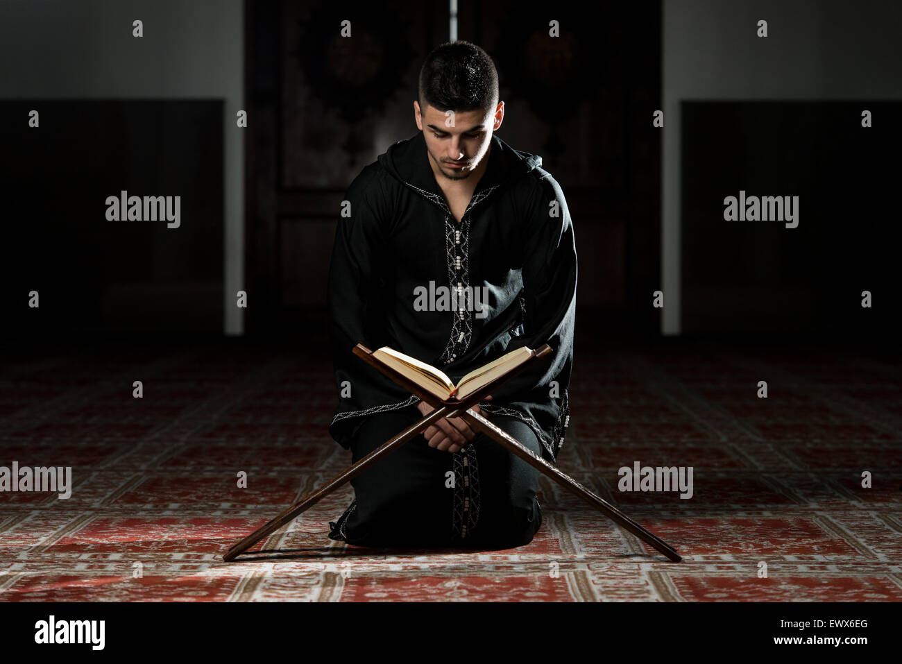 Arabic Muslim Man Reading Holy Islamic Book Koran Stock Photo - Alamy