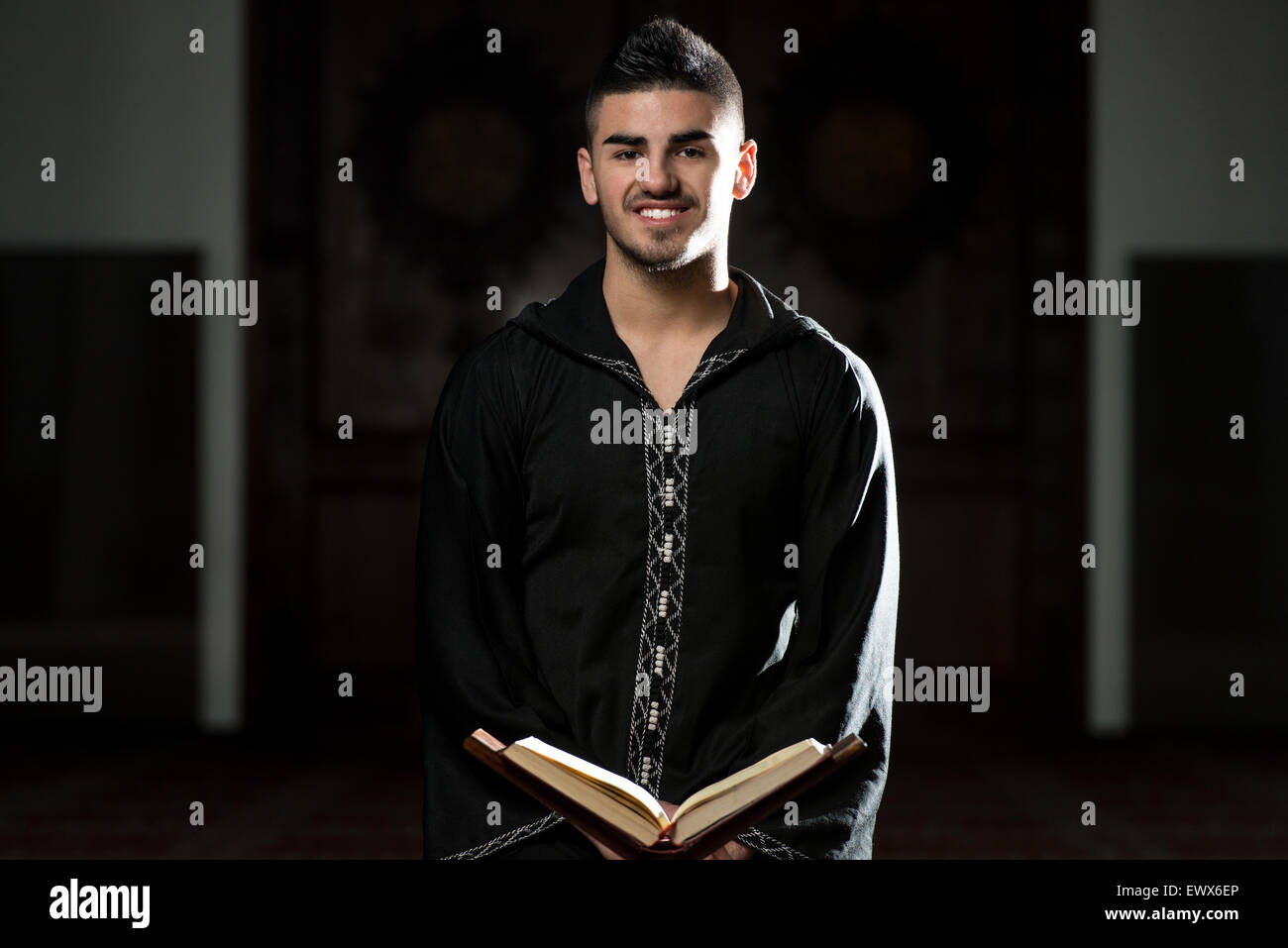 Arabic Muslim Man Reading Holy Islamic Book Koran Stock Photo - Alamy