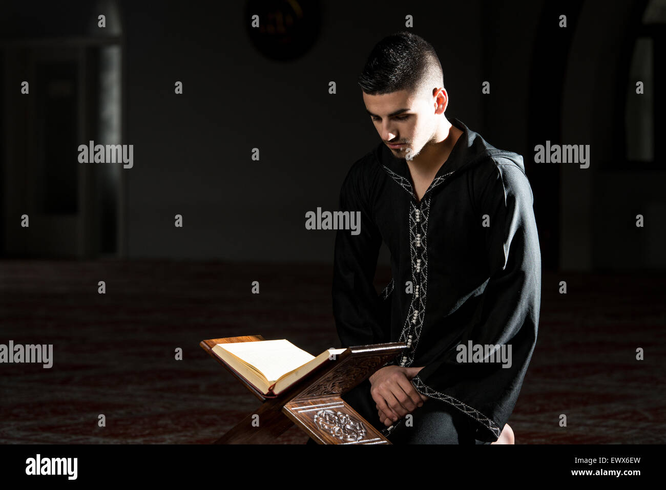 Arabic Muslim Man Reading Holy Islamic Book Koran Stock Photo - Alamy