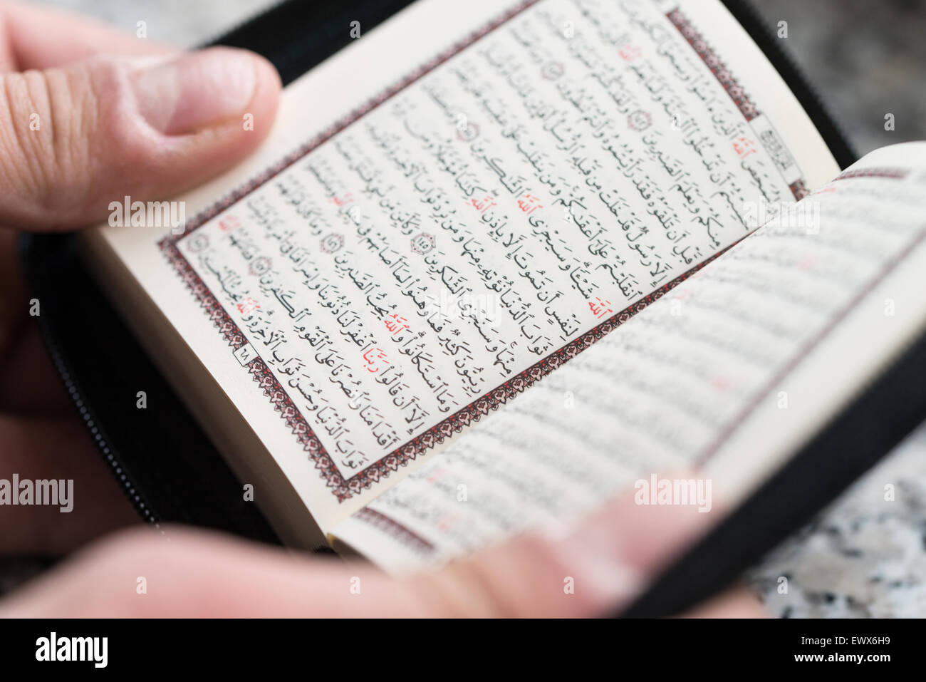 Muslim Man Is Reading The Koran Stock Photo - Alamy