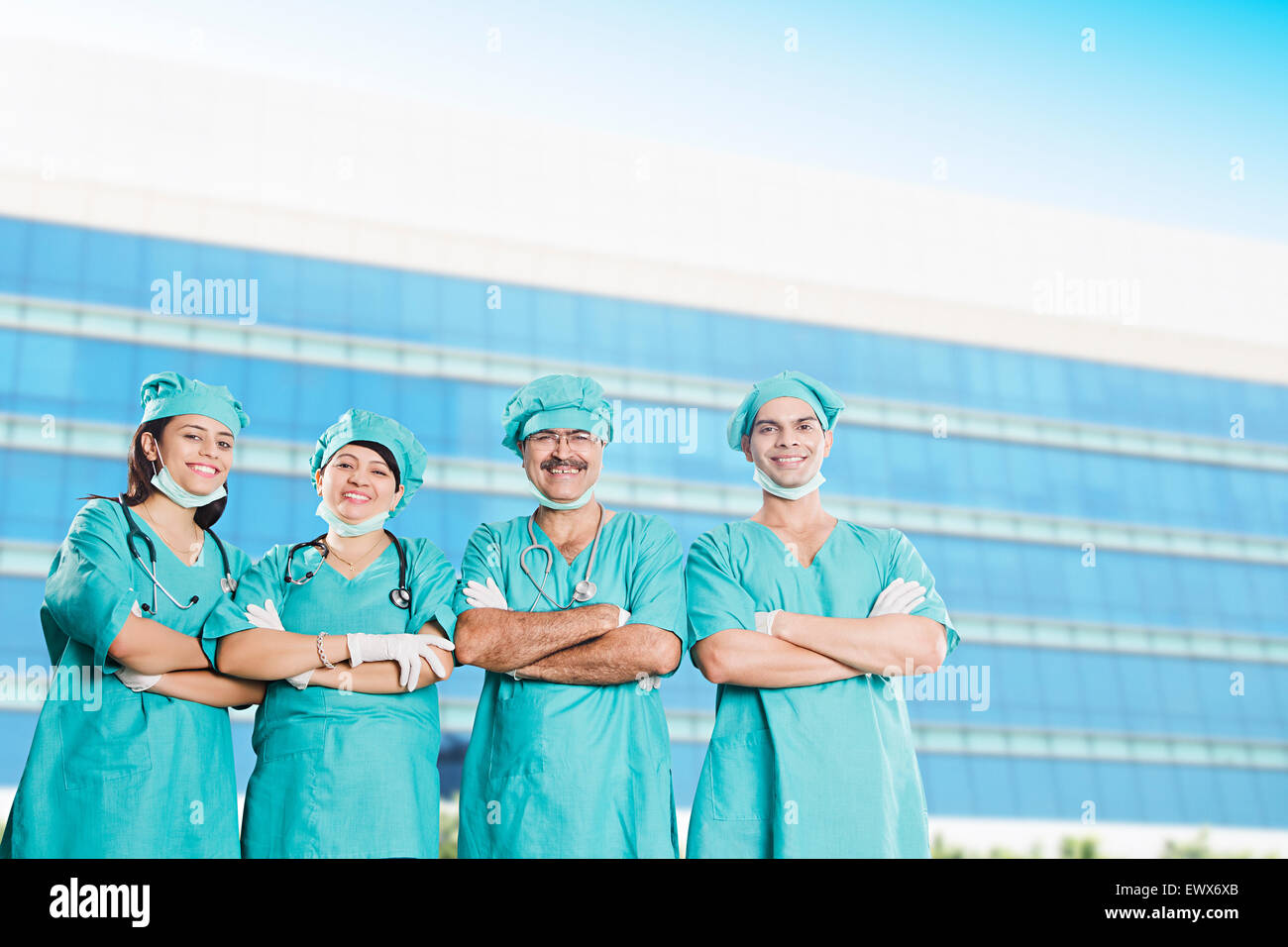 4 indian Surgeon Doctor Colleague standing pose Stock Photo - Alamy