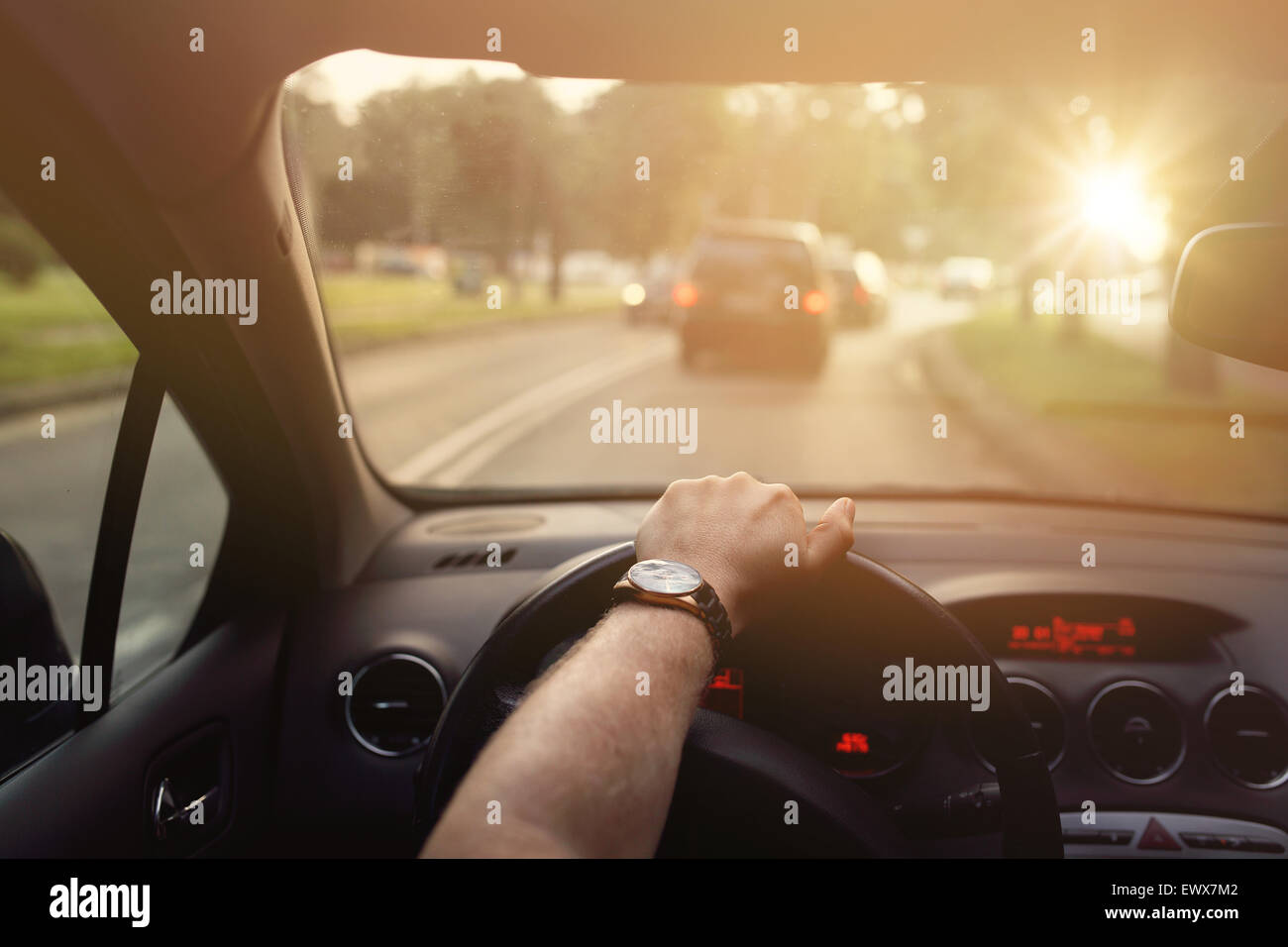 Driving down the street in car on a sunny beautiful day Stock Photo - Alamy