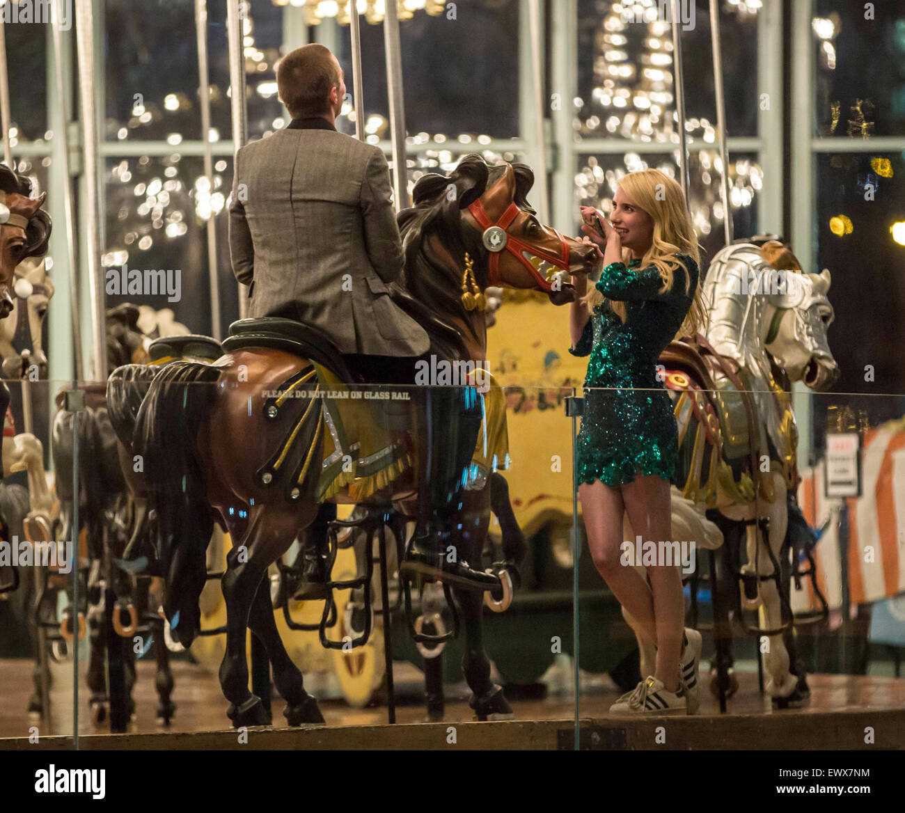 Emma Roberts and Dave Franco film a scene on a carousel for their new ...