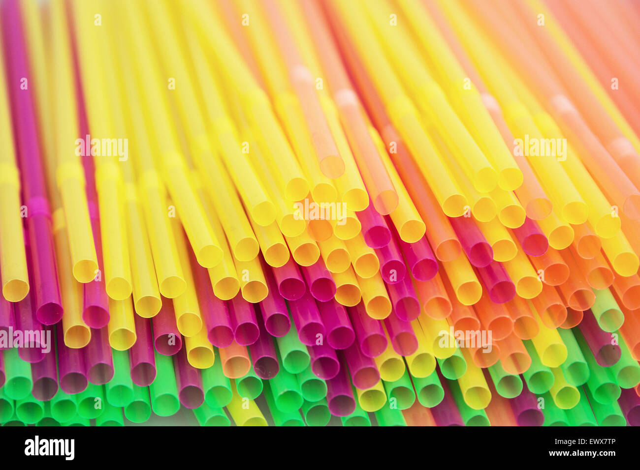 Background of plastic colored drinking straws. Party theme Stock Photo ...