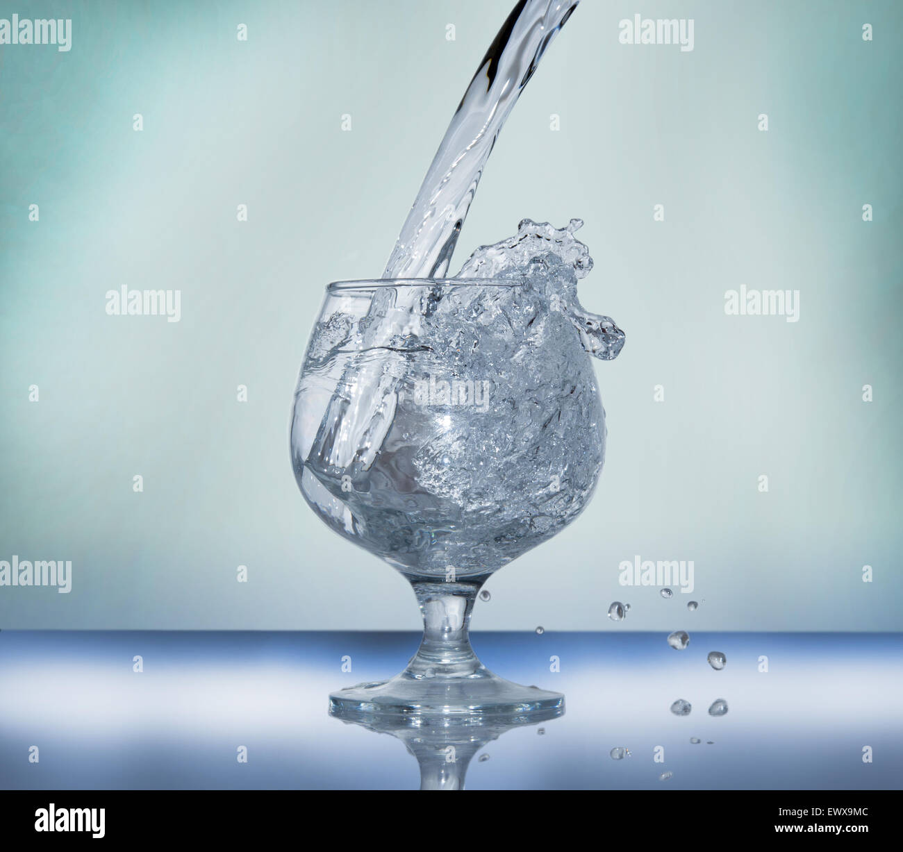 Frozen water splash in a glass Stock Photo - Alamy