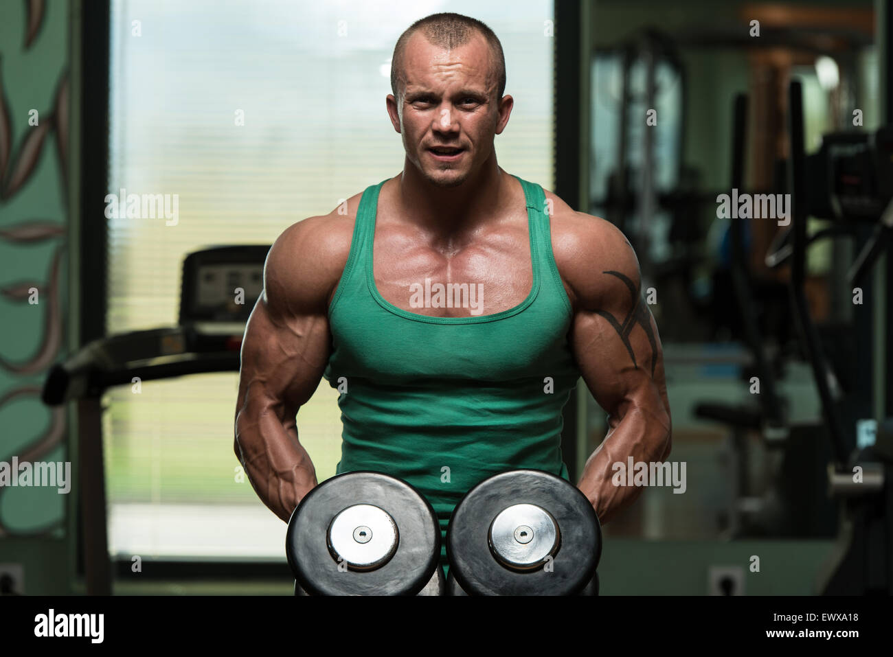 Young Man Preforming Dumbbell Lateral Raise - Exercise For Shoulders ...
