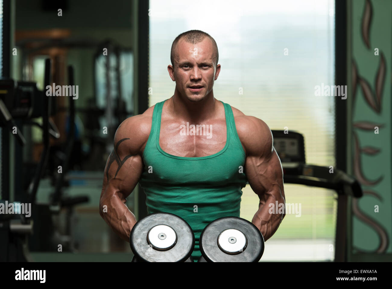 Young Man Preforming Dumbbell Lateral Raise - Exercise For Shoulders ...