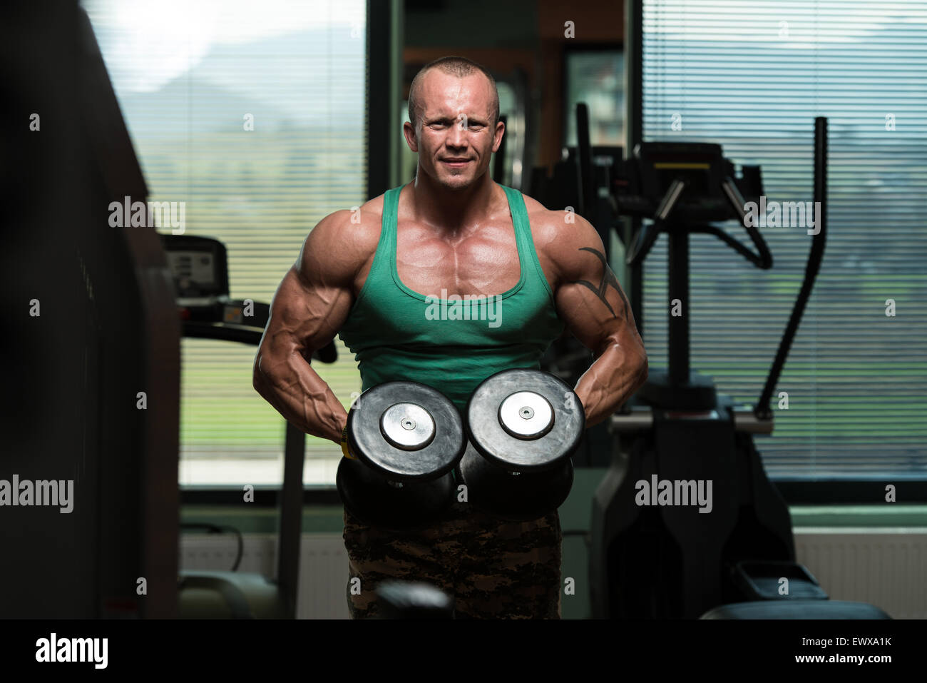 Young Man Preforming Dumbbell Lateral Raise - Exercise For Shoulders ...