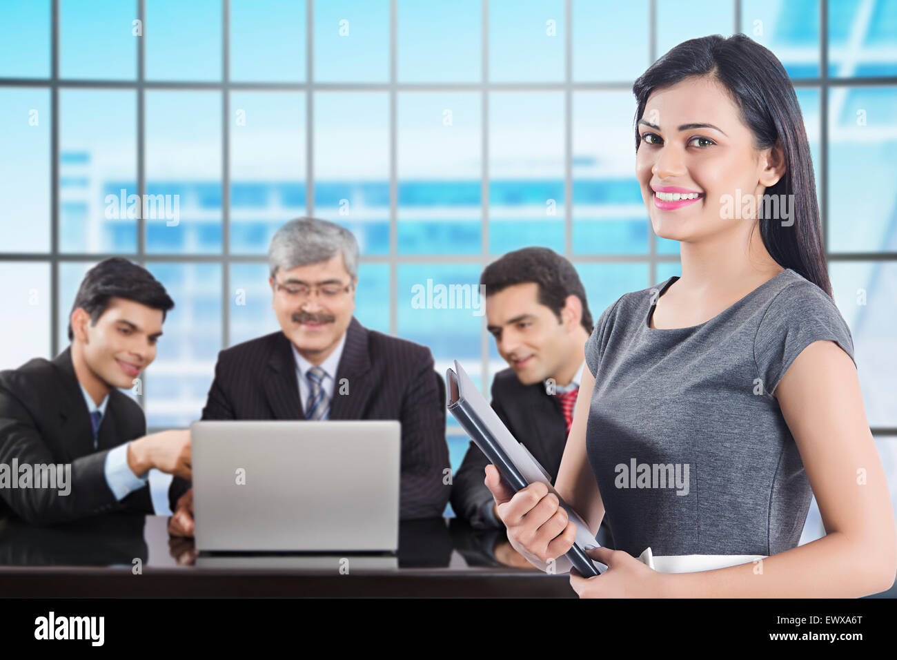 4 indian Business group Partner Discussion Stock Photo - Alamy