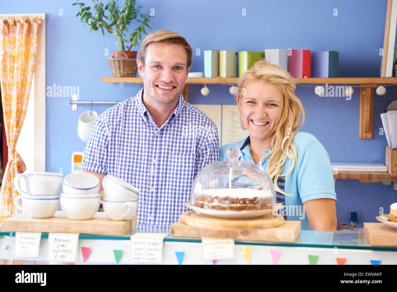 Portrait Of Couple Running Cafe Together Stock Photo - Alamy