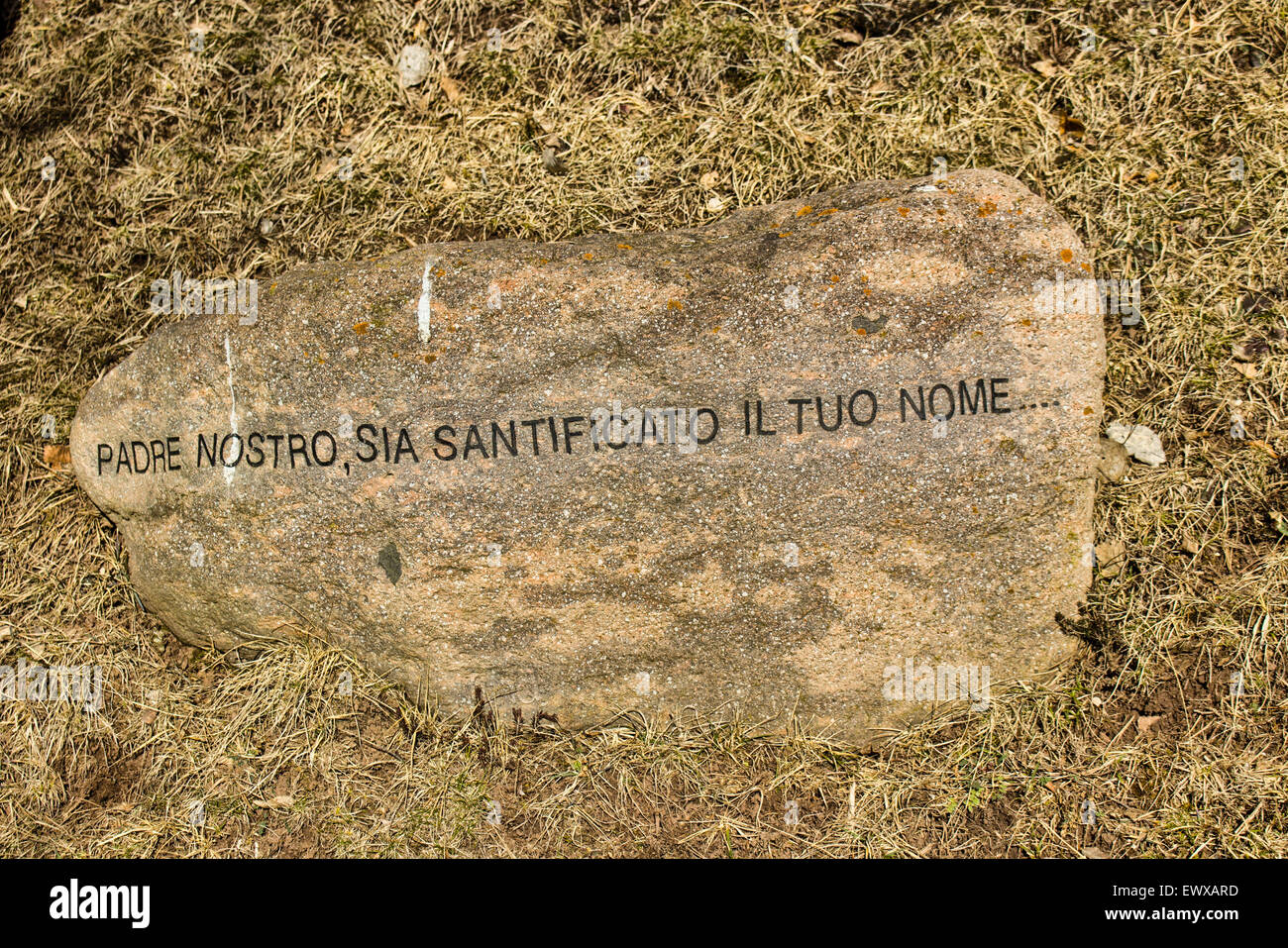 Italian sentence from The Lord’s Prayer printed in block letters on a ...