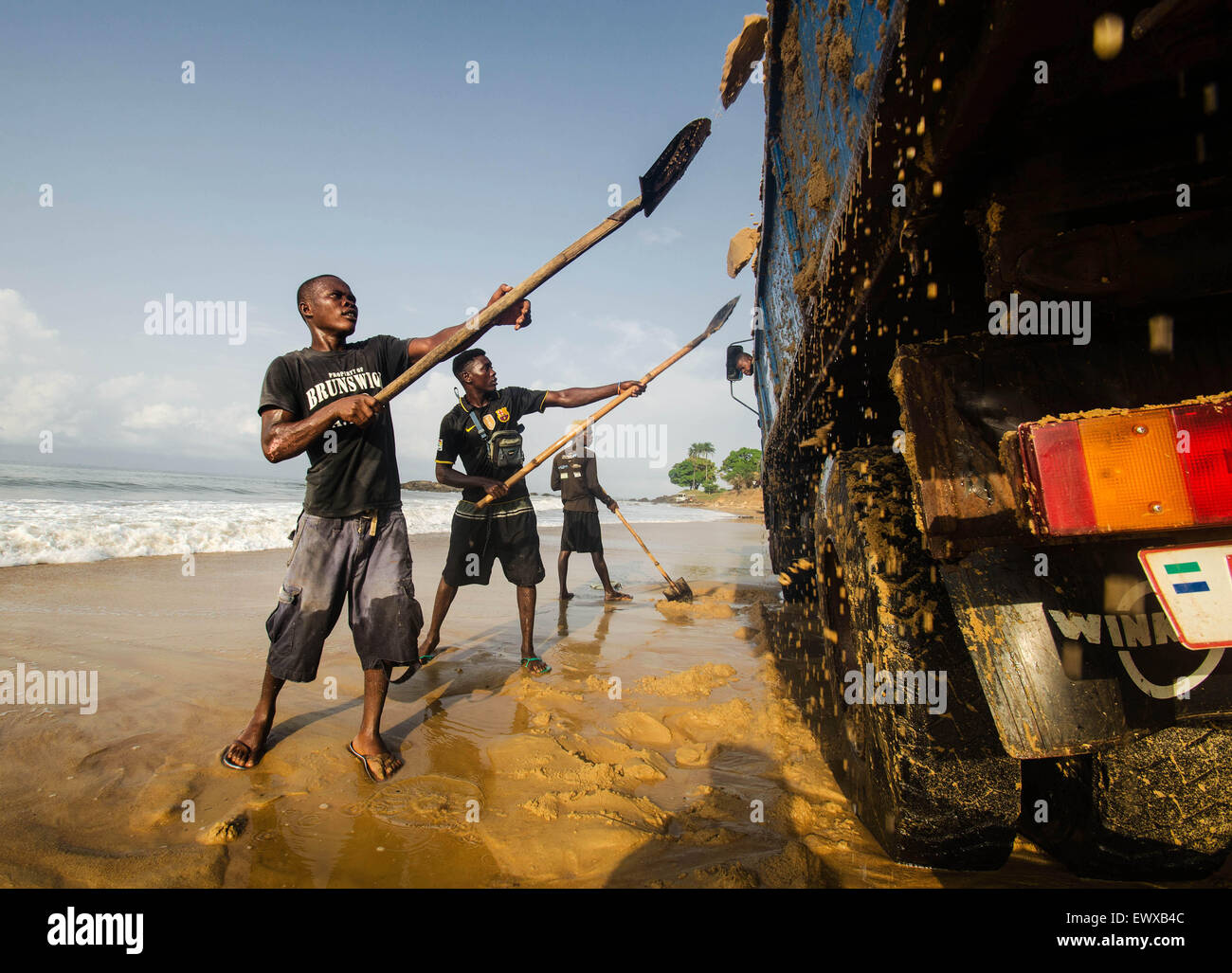 Sand mining along beaches outside Freetown, Sierra Leone Stock Photo ...