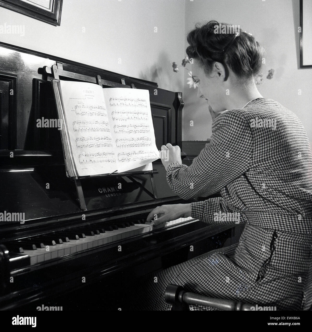 Woman playing white piano hi-res stock photography and images - Alamy