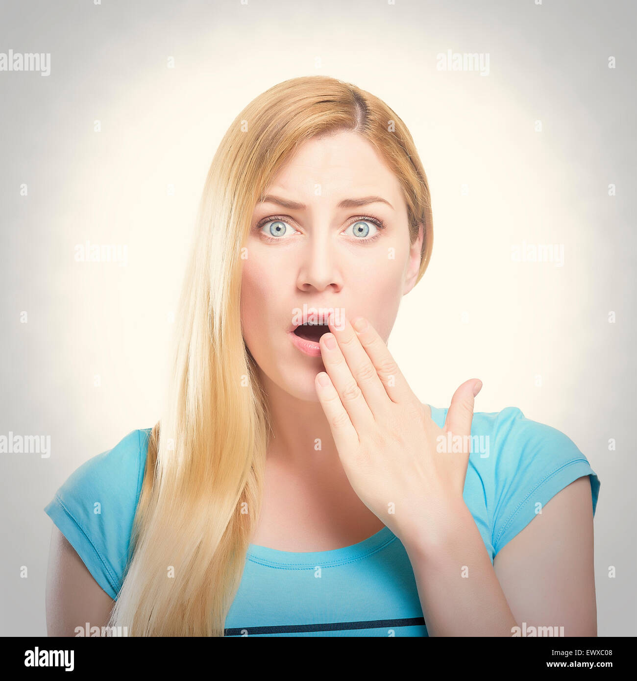 Shocked blonde lady Stock Photo - Alamy
